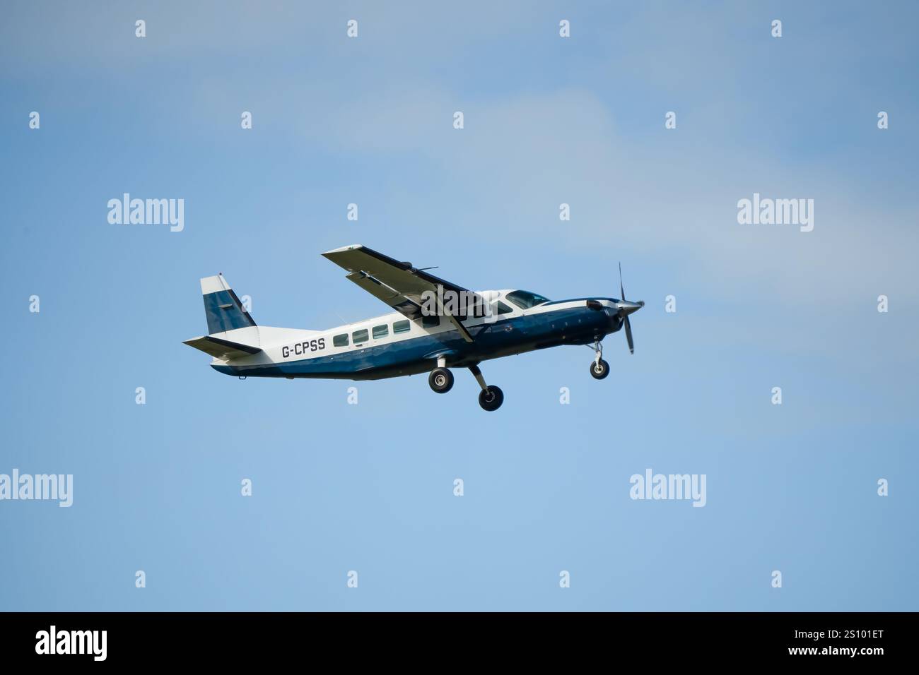 Cessna 208b Grand Caravan G-CPSS fixed wing aircraft climbing from ...