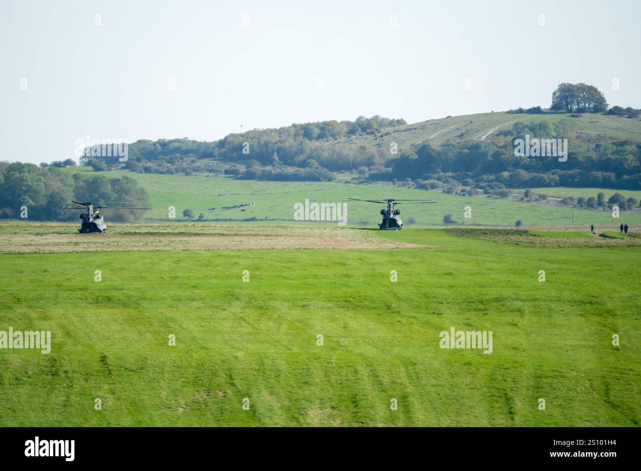 a pair of British army Boeing Chinook CH-47 helicopters hovering over ...