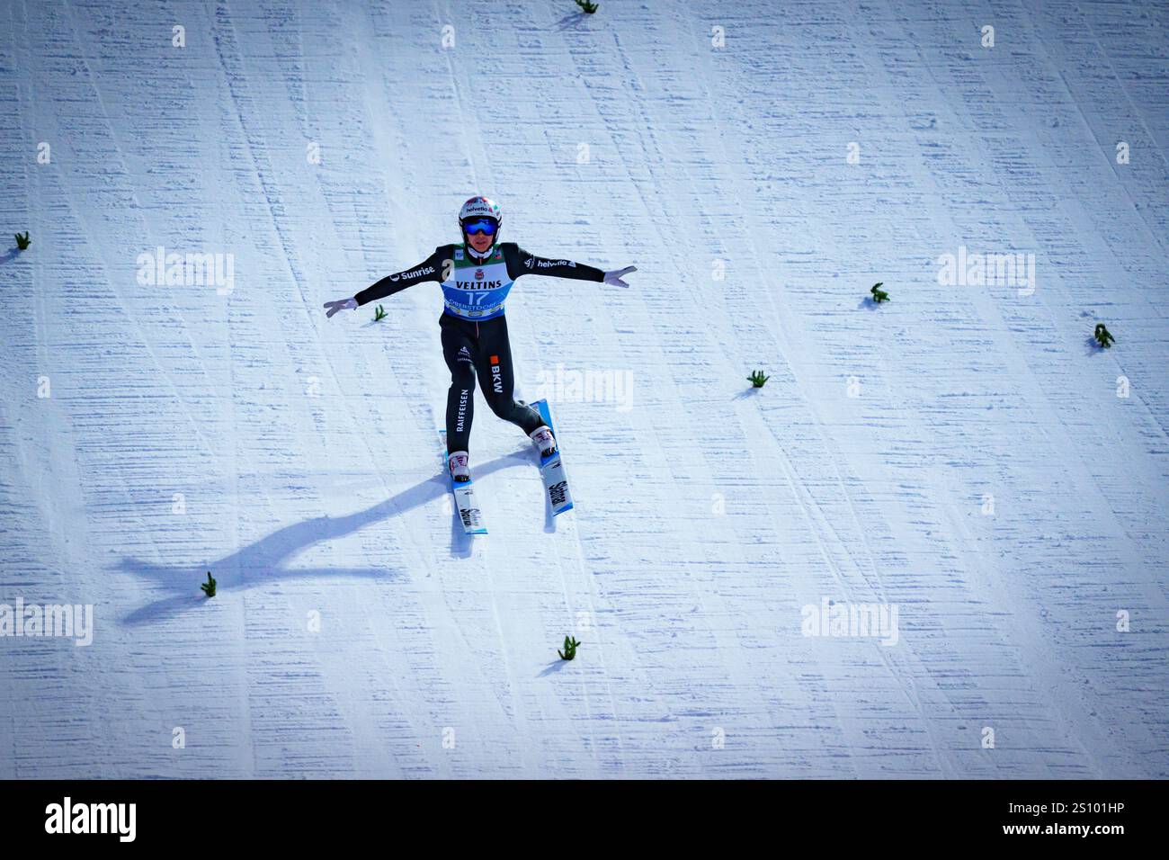 Simon Ammann, SUI in flight action at the 73. Four Hills Tournament Ski ...