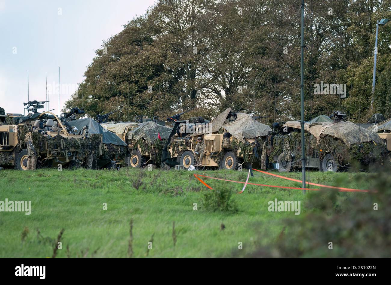 a division of British army cavalry and armoured brigades assembled in a ...