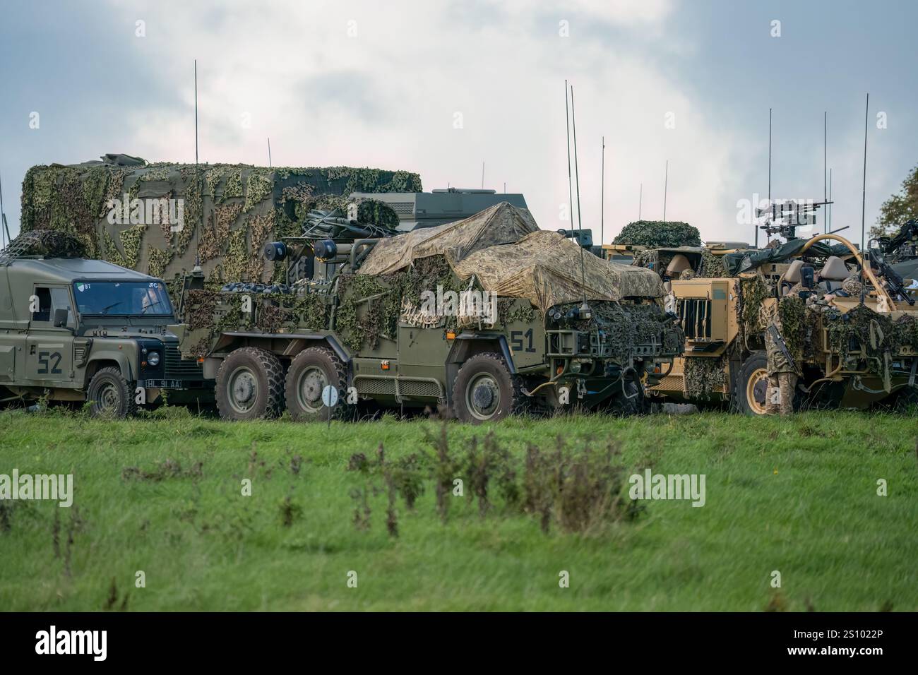 a division of British army cavalry and armoured brigades assembled in a ...
