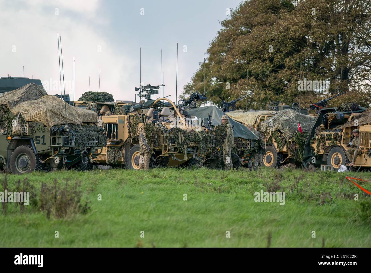 a division of British army cavalry and armoured brigades assembled in a ...