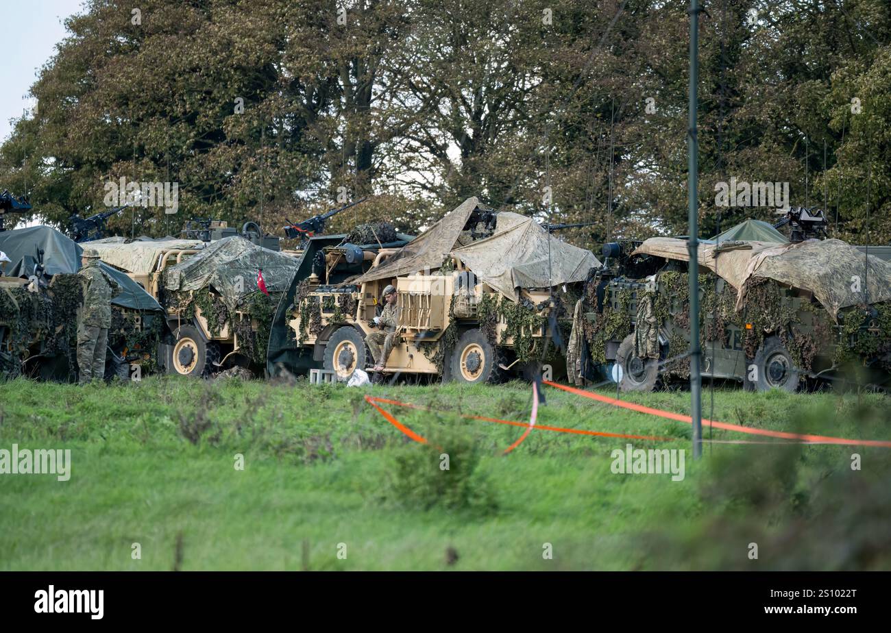 a division of British army cavalry and armoured brigades assembled in a ...