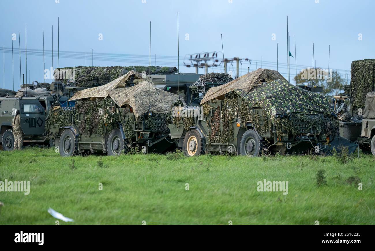 a division of British army cavalry and armoured brigades assembled in a ...