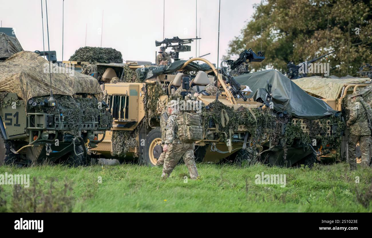 a division of British army cavalry and armoured brigades assembled in a ...