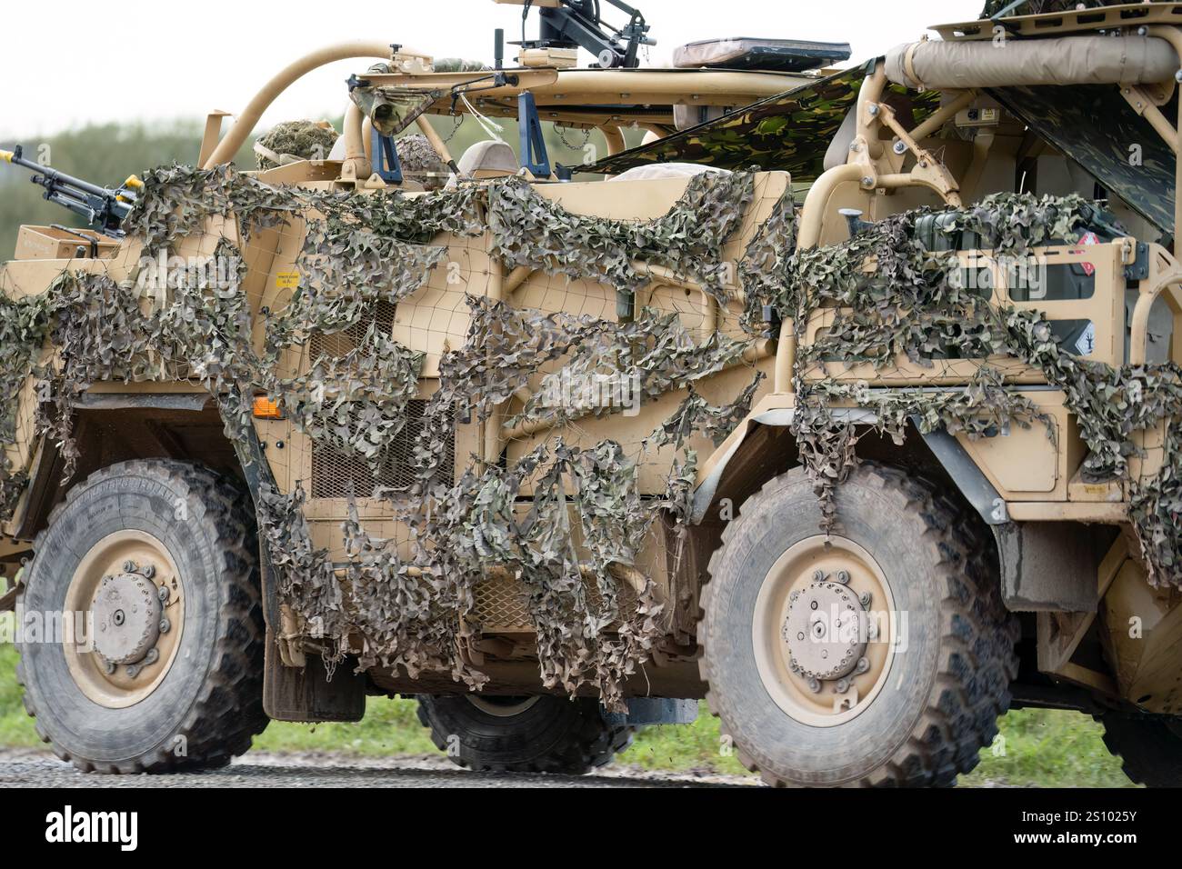 close-up of a British army Supacat Jackal 4x4 vehicle in action on a ...