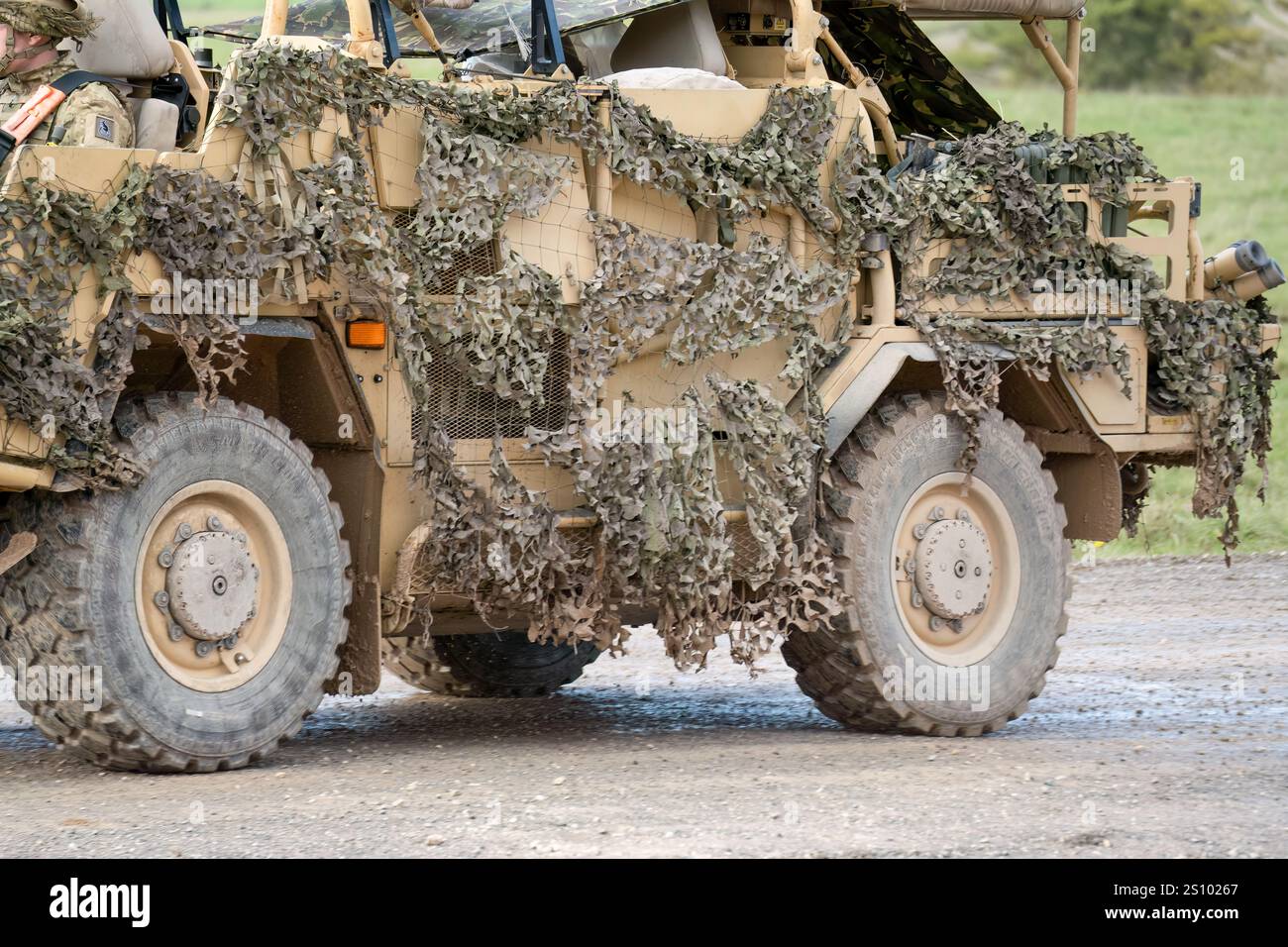 close-up of a British army Supacat Jackal 4x4 vehicle in action on a ...