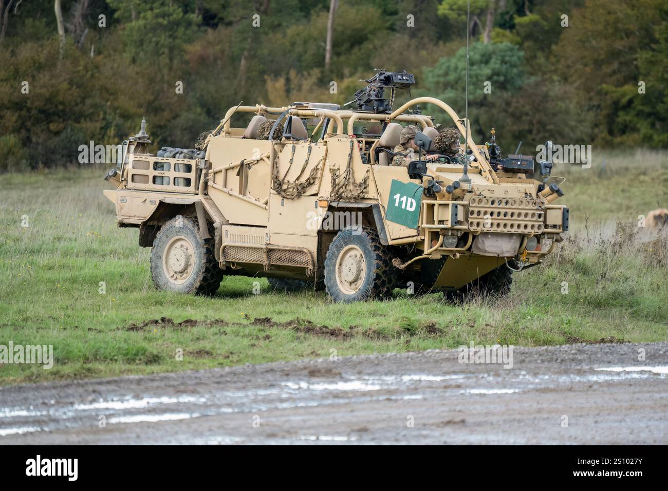 close-up of a British army Supacat Jackal 4x4 vehicle in action on a ...
