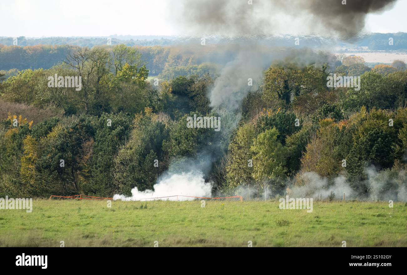 white smoke rising after an artillery shell impact explosion Stock ...