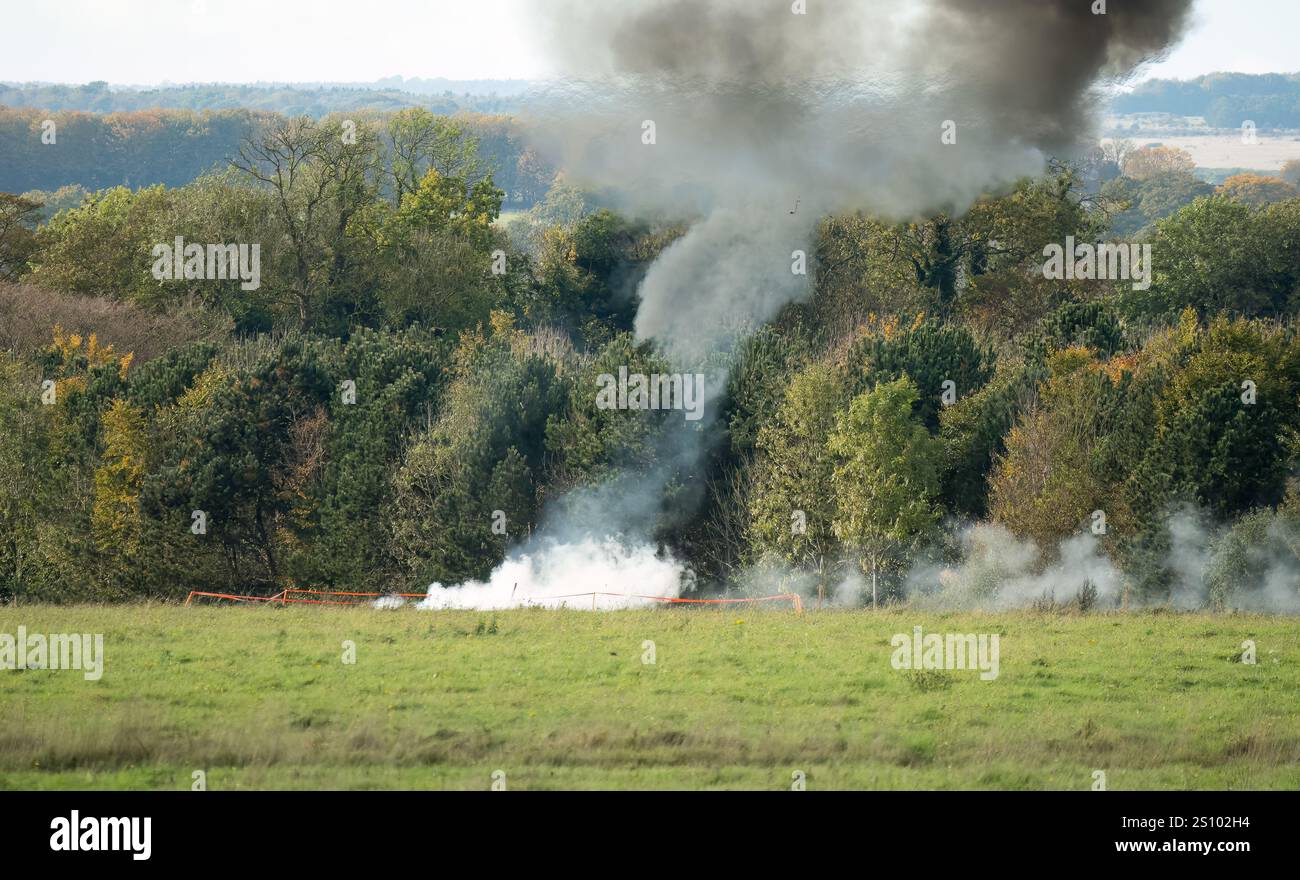 white smoke rising after an artillery shell impact explosion Stock ...