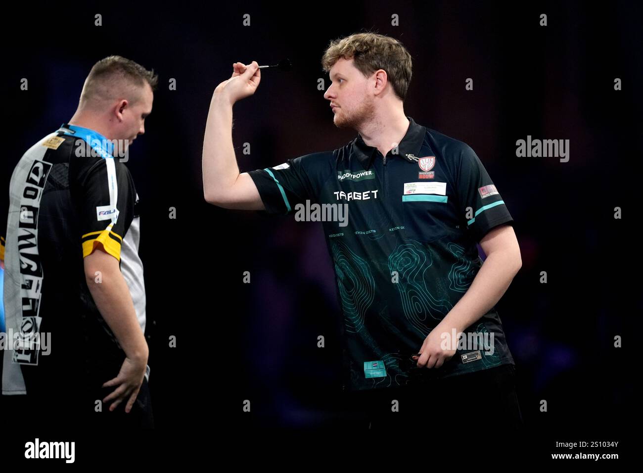 Kevin Doets throws during his match against Chris Dobey during day ...