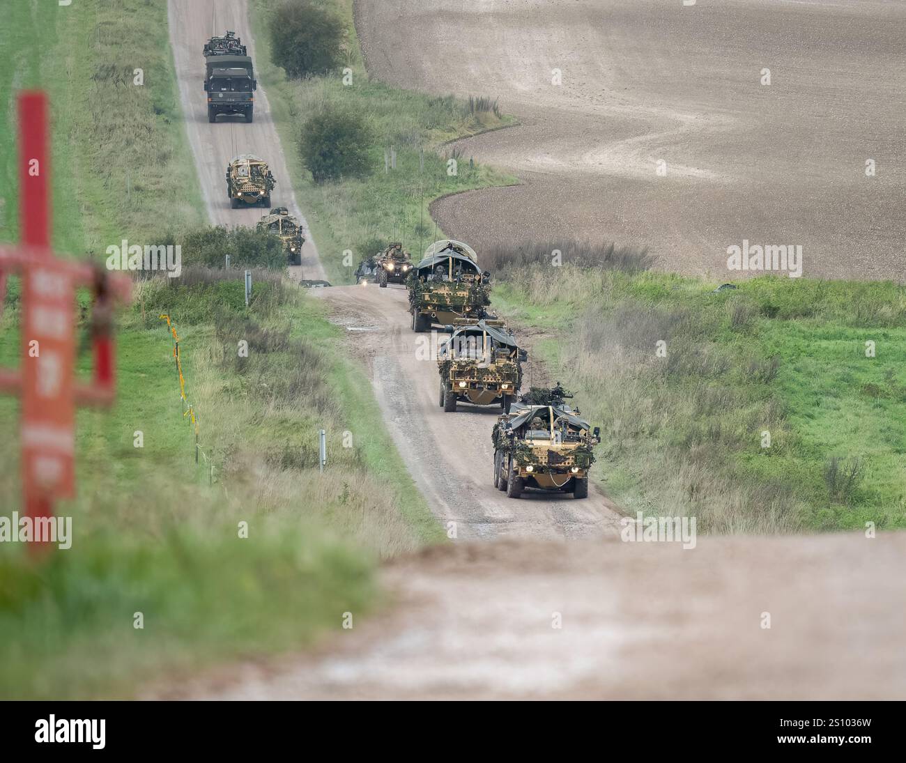 a convoy of British army Supacat Jackal and Coyote rapid assault, fire ...