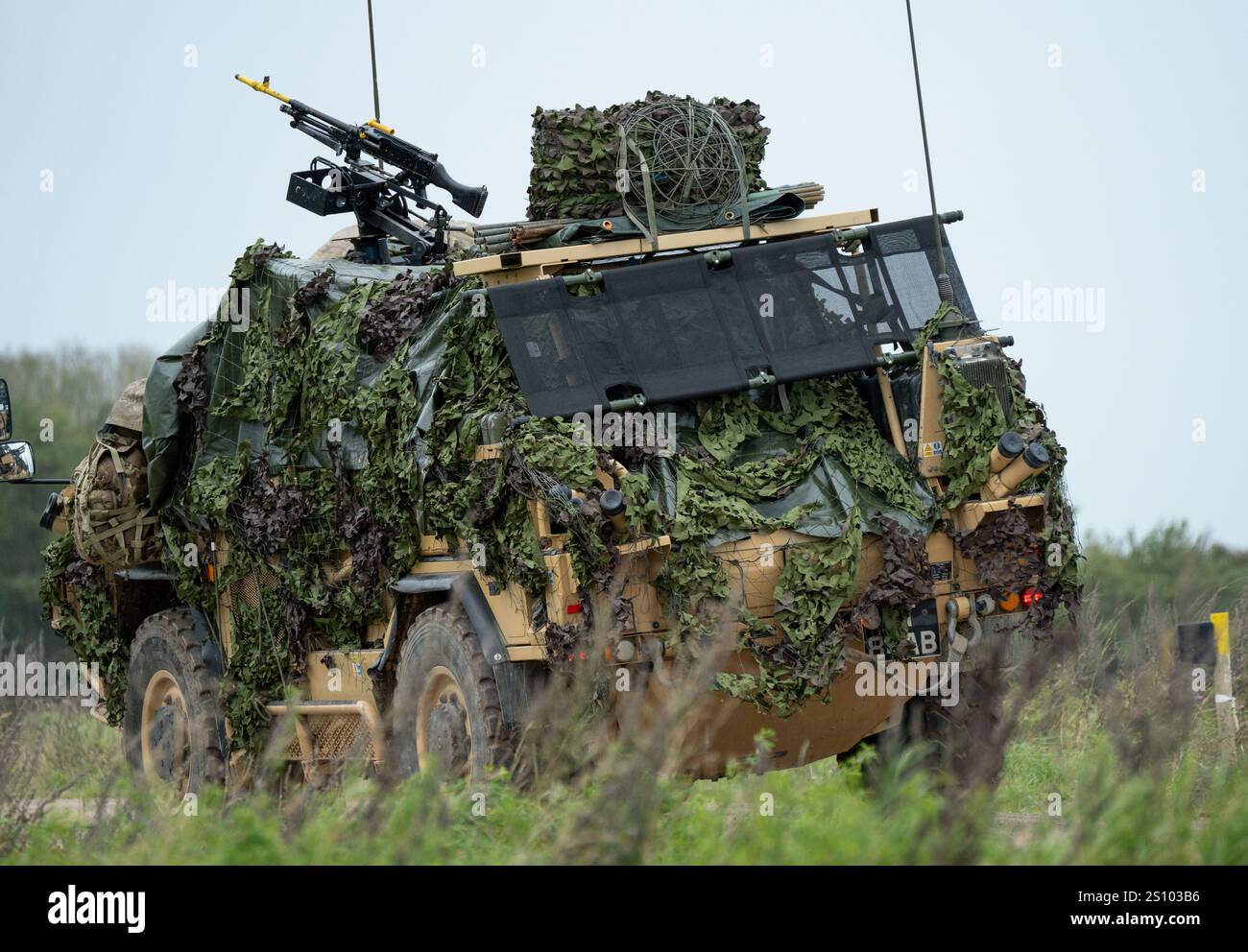 close-up of a British army Supacat Jackal 4x4 vehicle in action on a ...