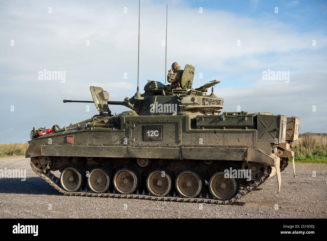 commander and gunner directing a British army Warrior FV510 IFV in ...