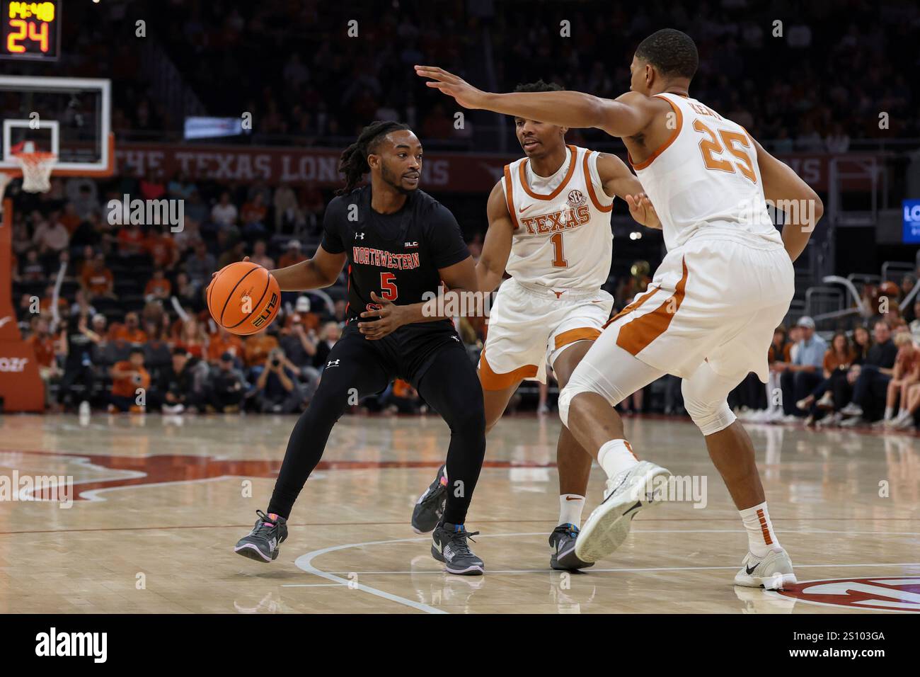 AUSTIN, TX - DECEMBER 29: Northwestern State Demons guard Micah Thomas ...