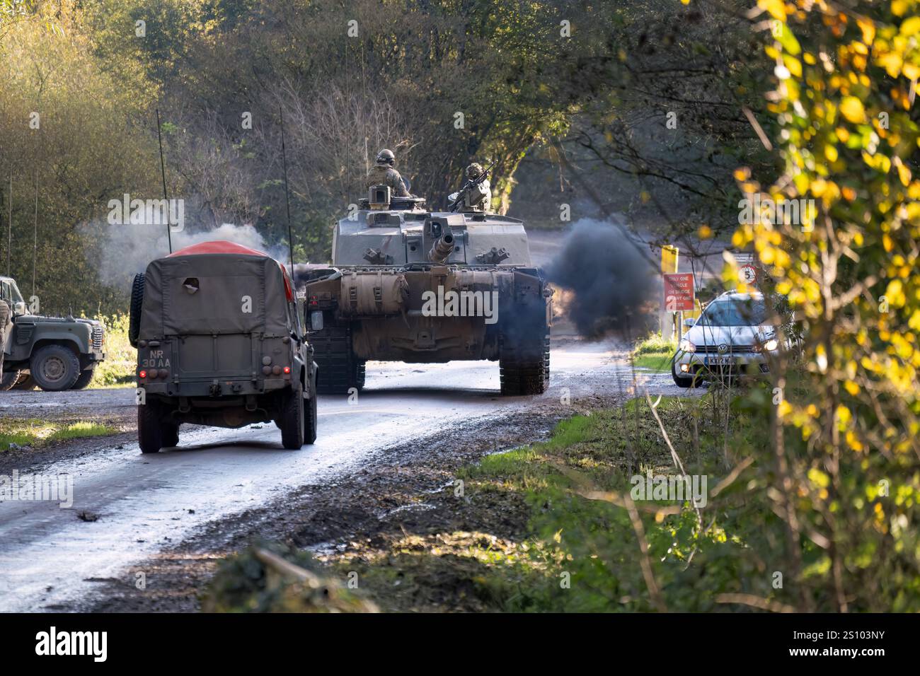 a British army FV4034 Challenger 2 ii main battle tank escorted along a ...