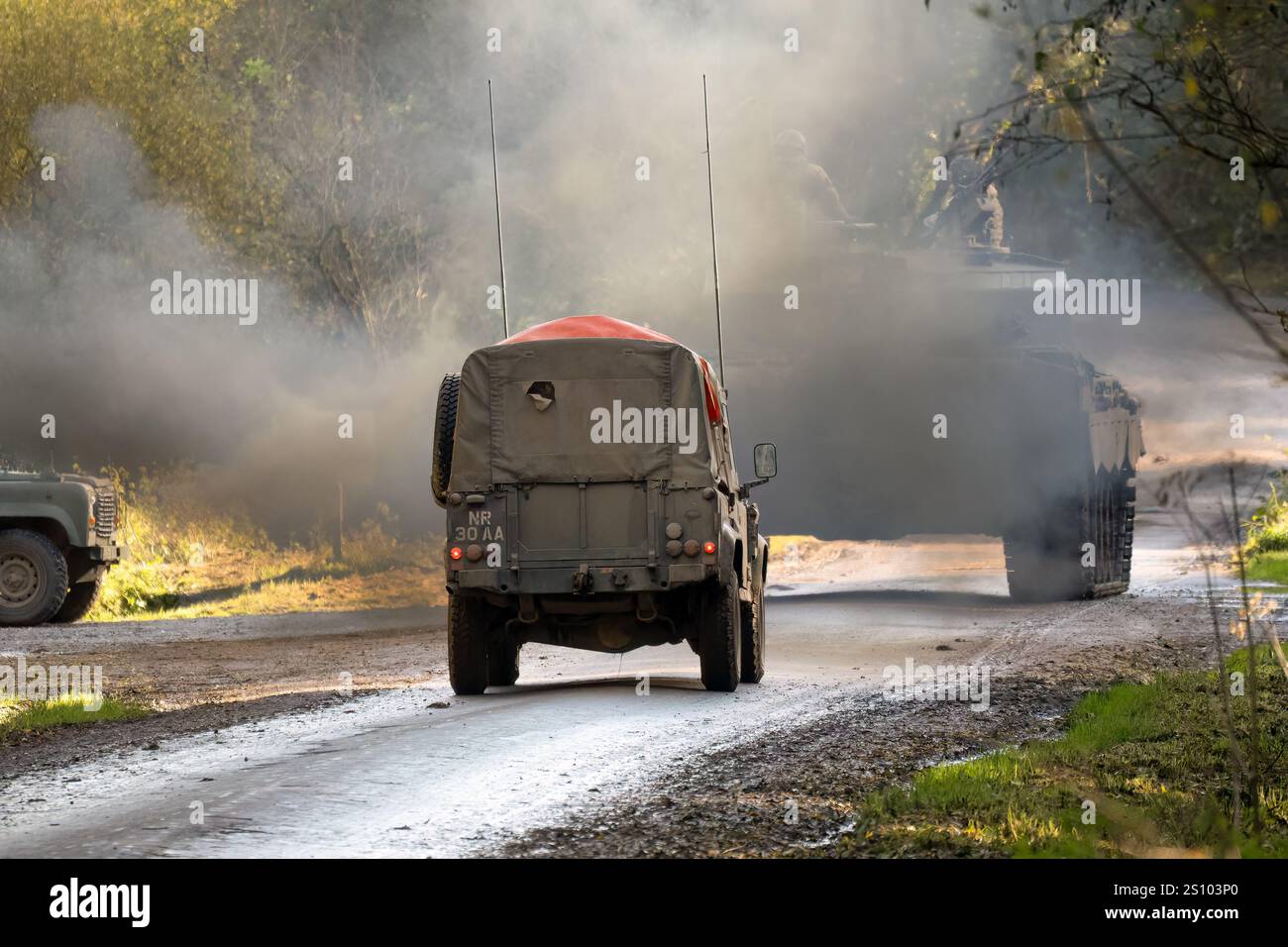 a British army FV4034 Challenger 2 ii main battle tank escorted along a ...