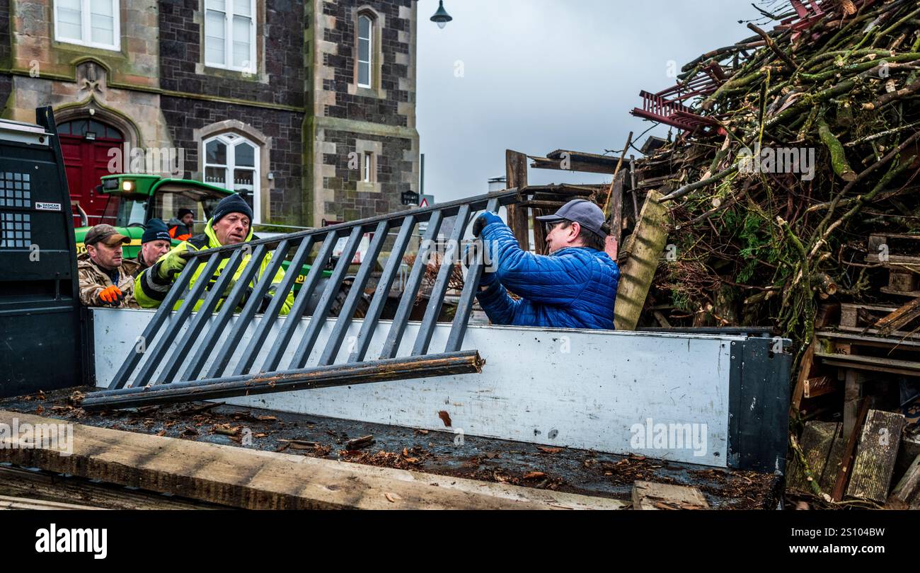 Building the traditional hogmanay bonfire in Biggar, South Lanarkshire ...