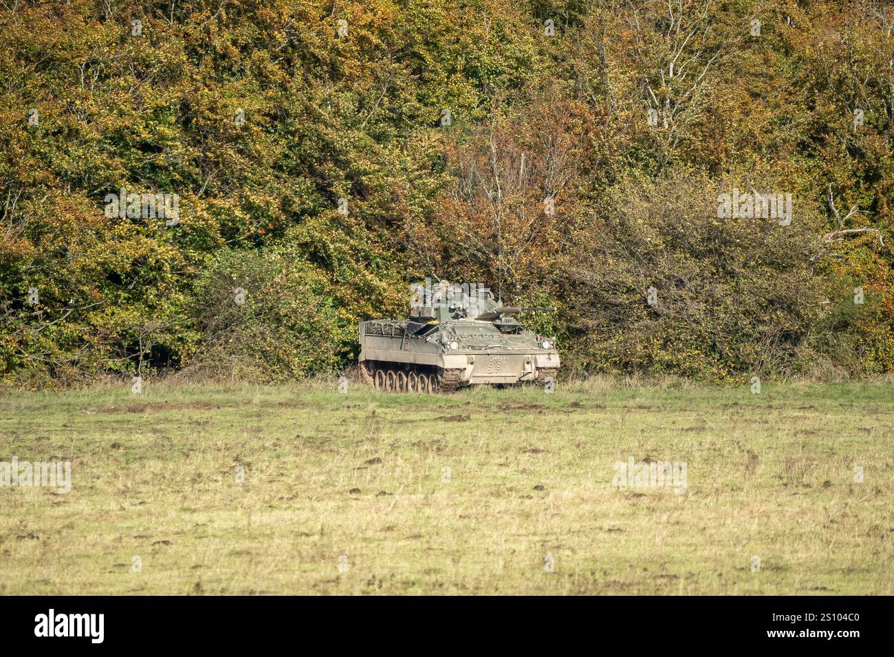 commander and gunner directing a British army Warrior FV510 IFV in ...