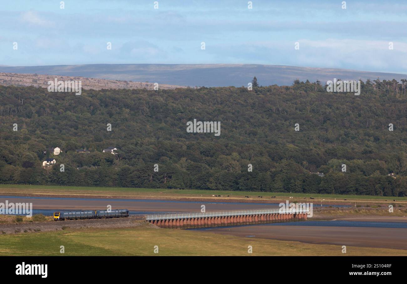 Northern Rail class CAF 195 trains crossing the Kent viaduct at Arnside ...
