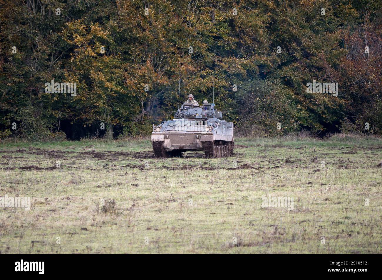 commander and gunner directing a British army Warrior FV510 IFV in ...
