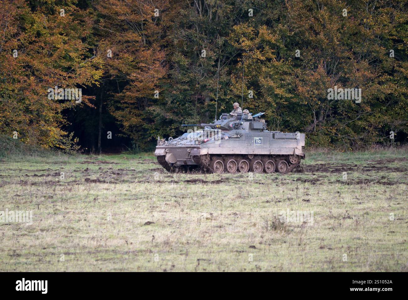 commander and gunner directing a British army Warrior FV510 IFV in ...