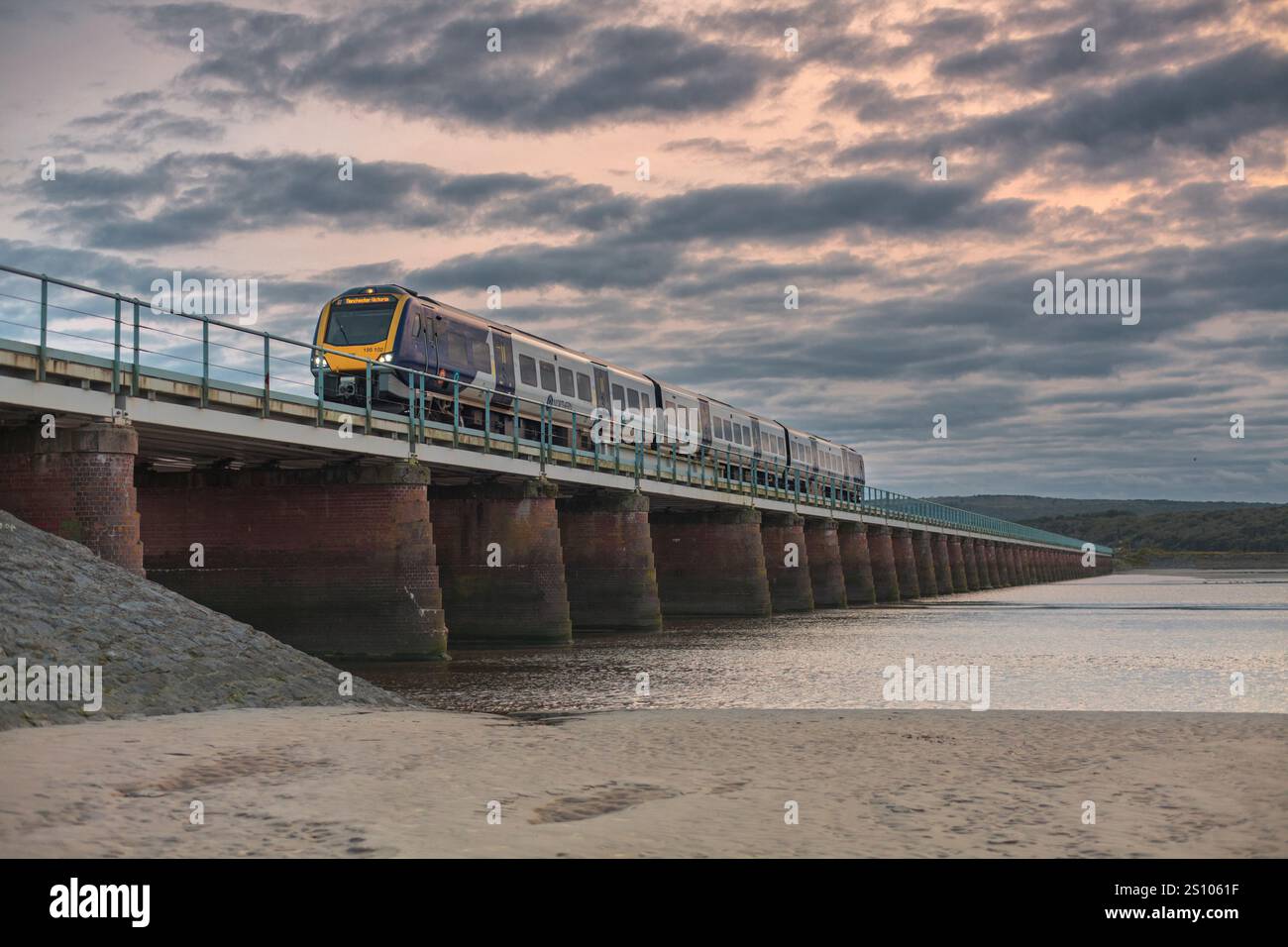 Northern rail class CAF 195 train crossing Arnside viaduct across the ...