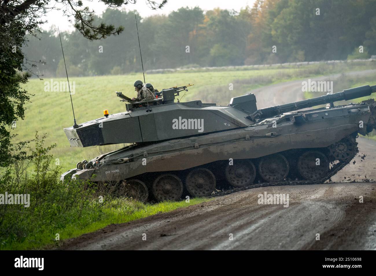 British army FV4034 Challenger 2 ii main battle tank crossing a raised ...