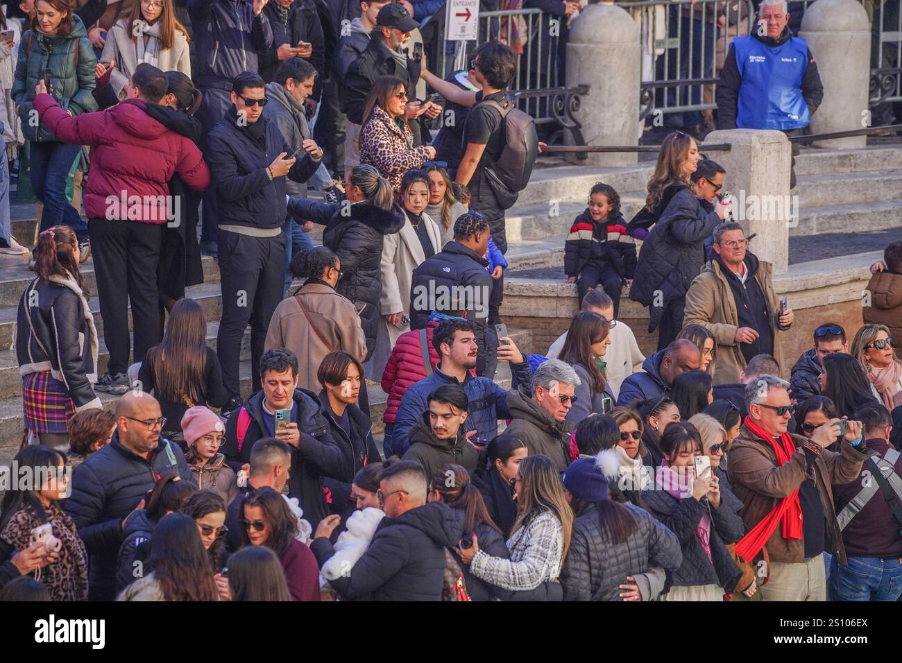 Rome, Italy. 30 December 2024 Large crowds gather at the Trevi fountain ...