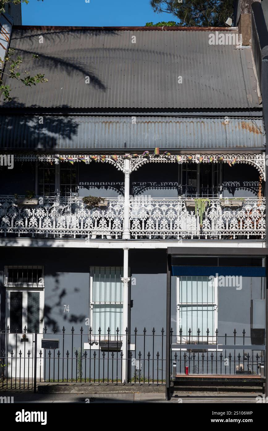 Residential Victorian-era house adorned with ornamental iron lacework ...