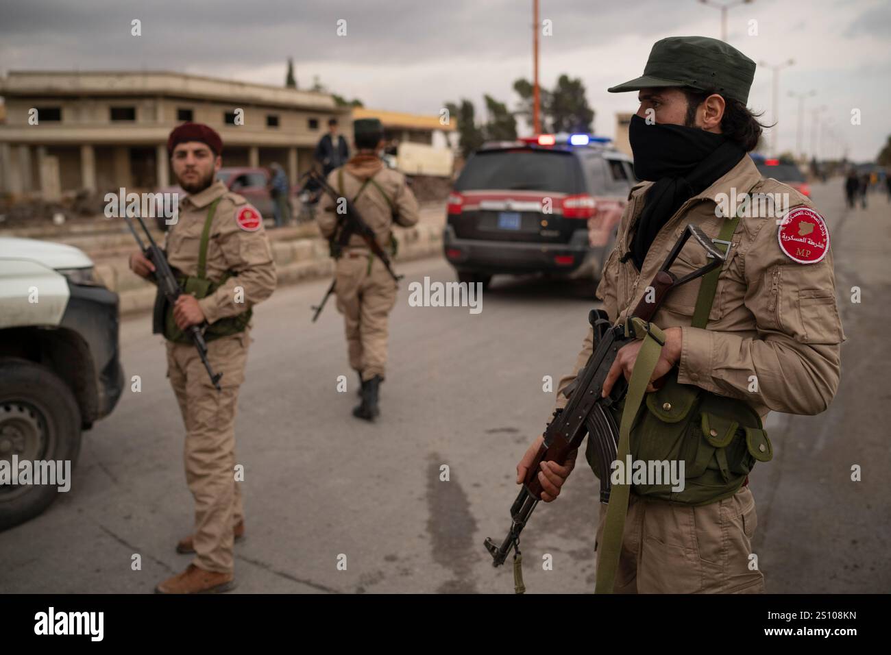 Members of the security forces of the newly formed Syrian government ...