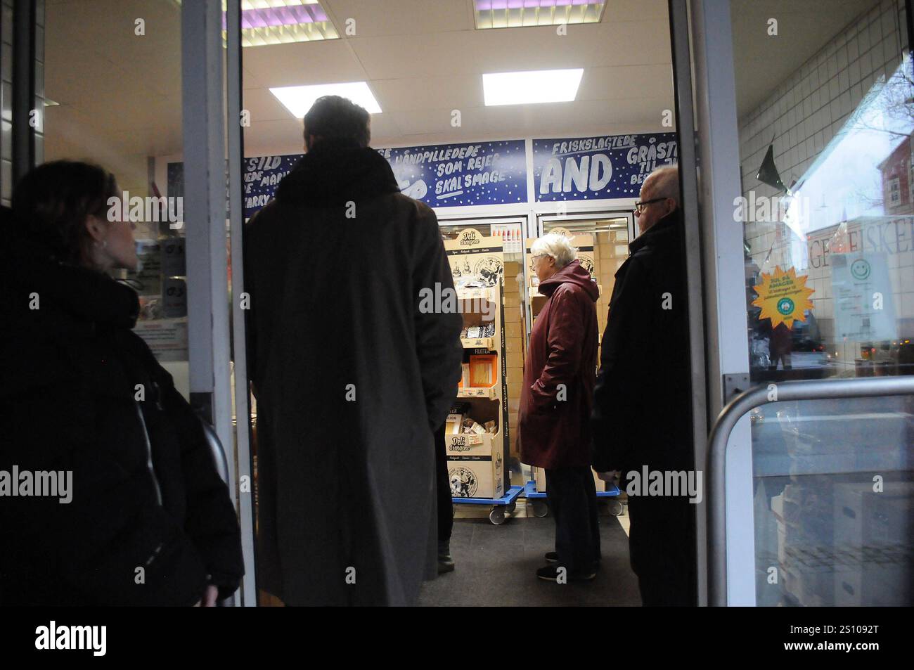 Copenhagen/ DenmarK/30 DECEMBER 2024/Danes waiting at fish shop in ...