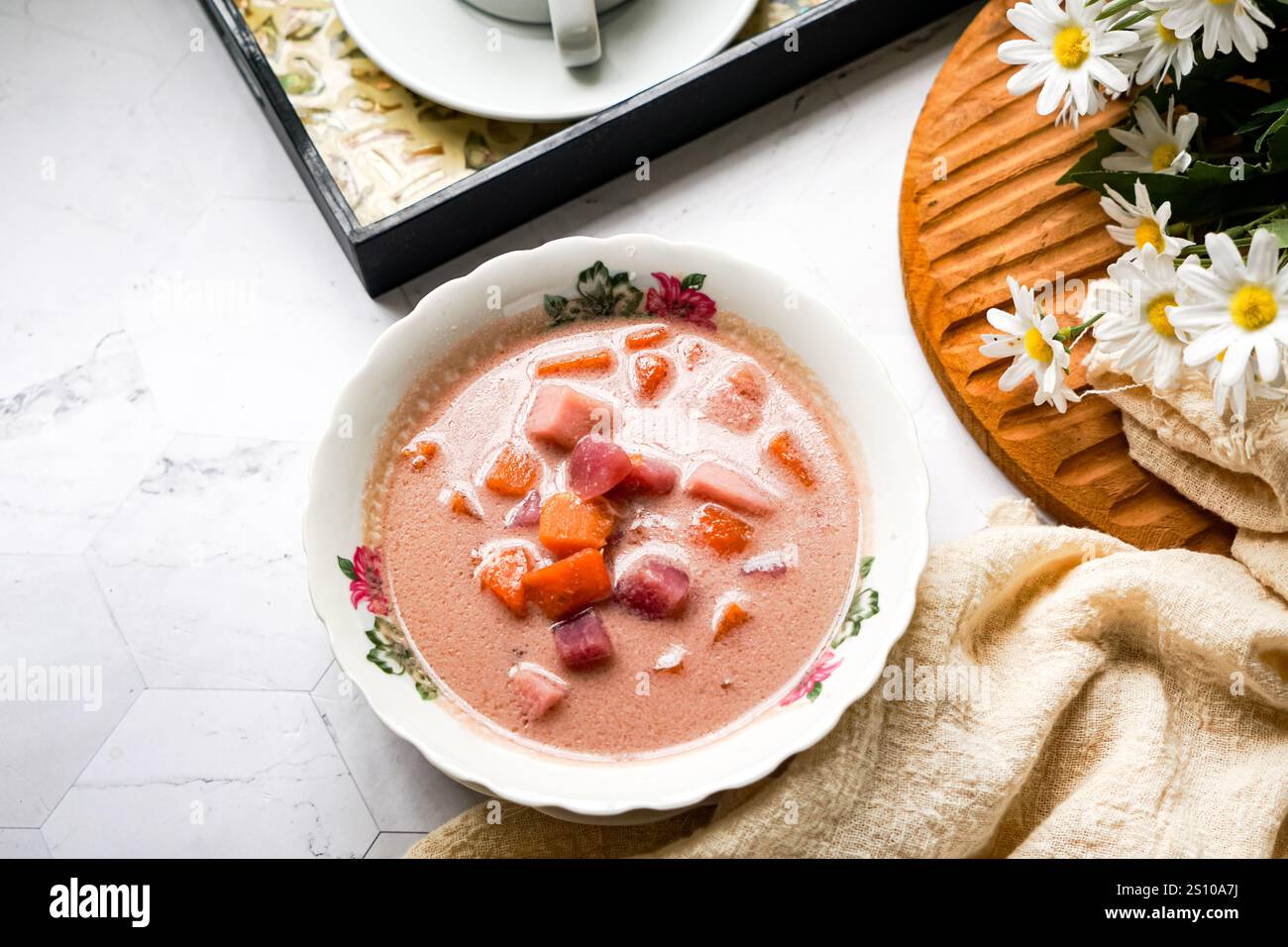 Bubur Cha Cha is a creamy coconut dessert with colorful cubes of purple ...