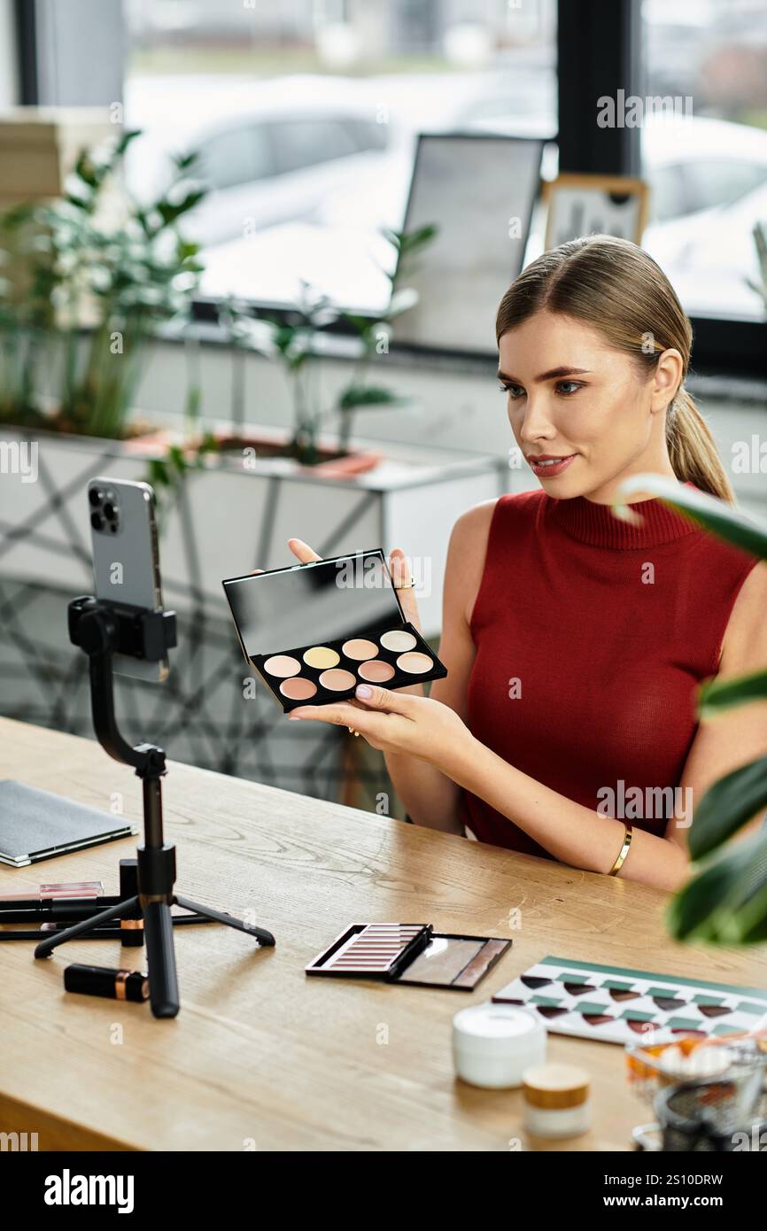 Young woman captivates her audience while showcasing makeup online in a ...