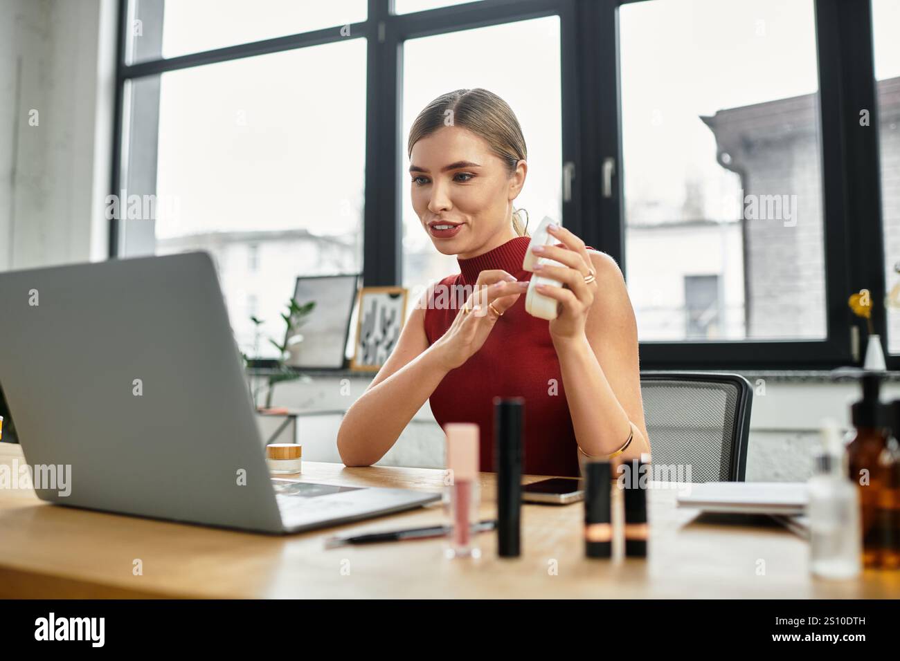 Streaming live from her stylish workspace, a beauty influencer ...