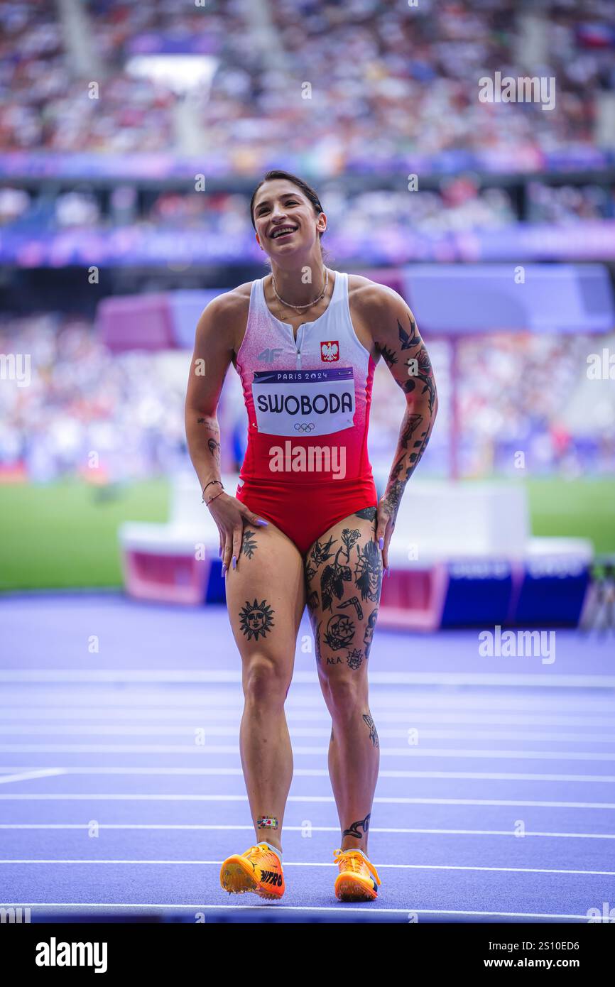 Ewa Swoboda participating in the 100 meters at the Paris 2024 Olympic ...