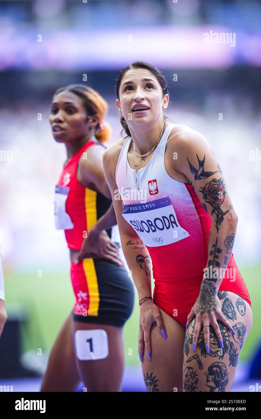Ewa Swoboda participating in the 100 meters at the Paris 2024 Olympic ...