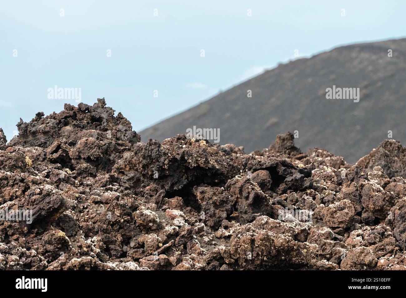 Volcanic lava mountains in Timanfaya National Park in Lanzarote in ...