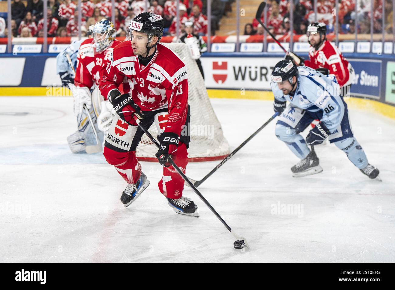 Team Canada's Manix Landry, left, in action during the semifinal game ...