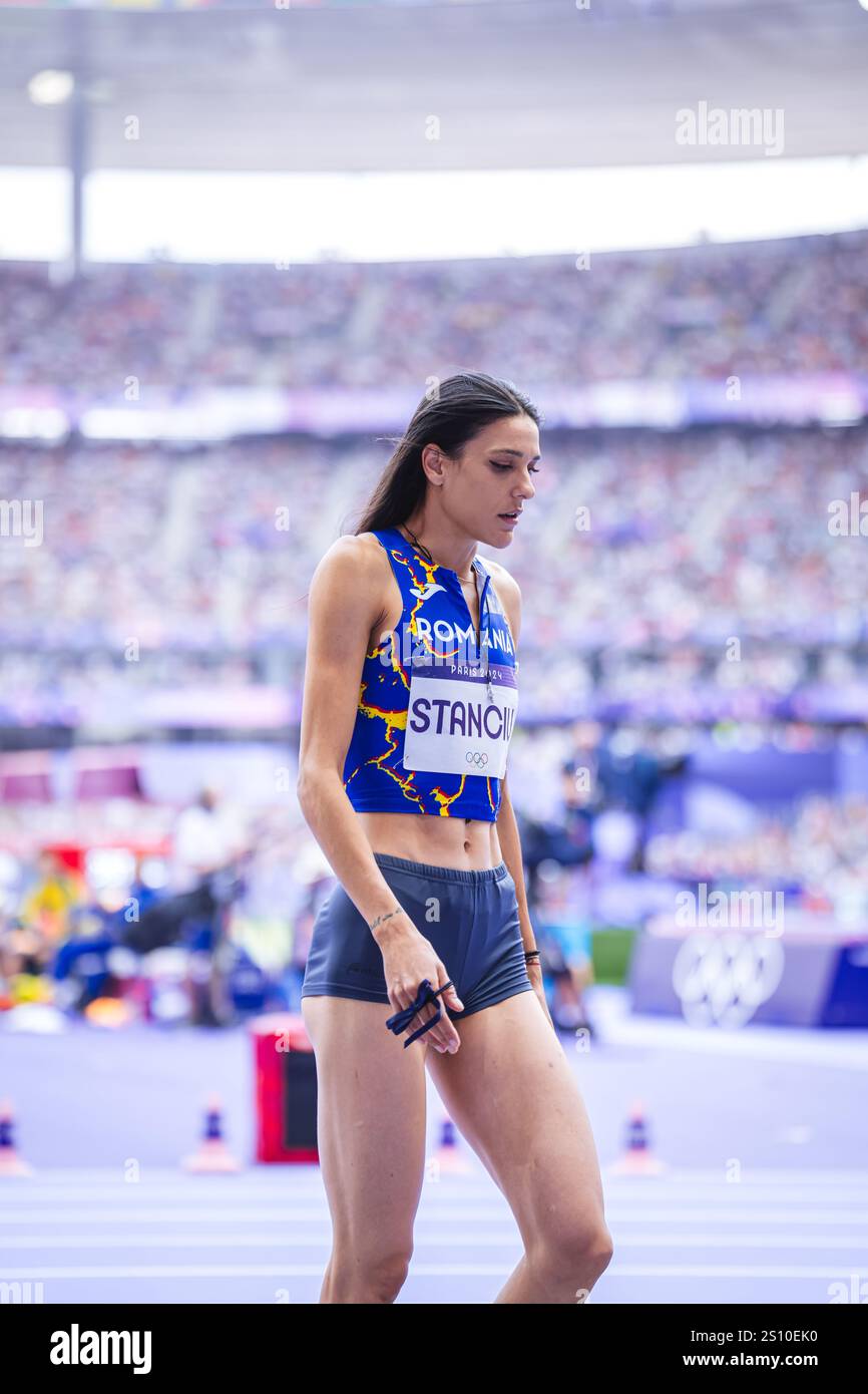 Daniela Stanciu participating in the high jump at the Paris 2024 ...