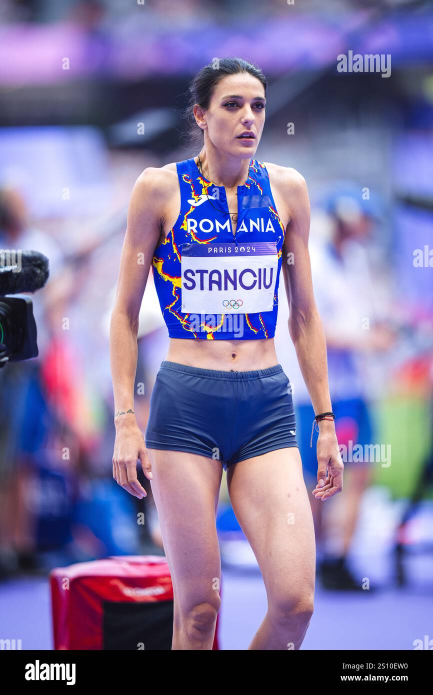 Daniela Stanciu participating in the high jump at the Paris 2024 ...