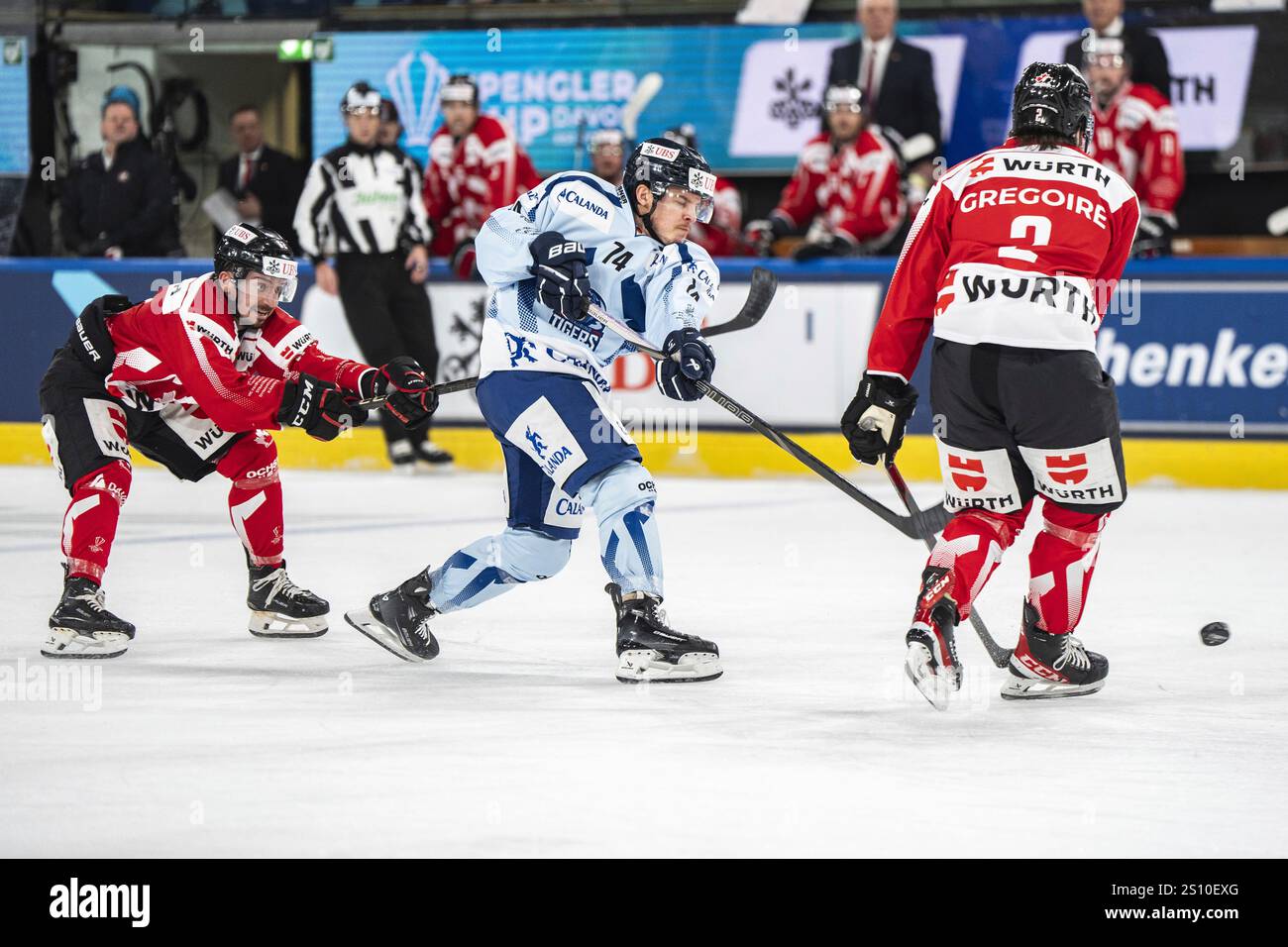 Team Canada's Brett Seney, left, Straubing's Travis St. Denis, center ...