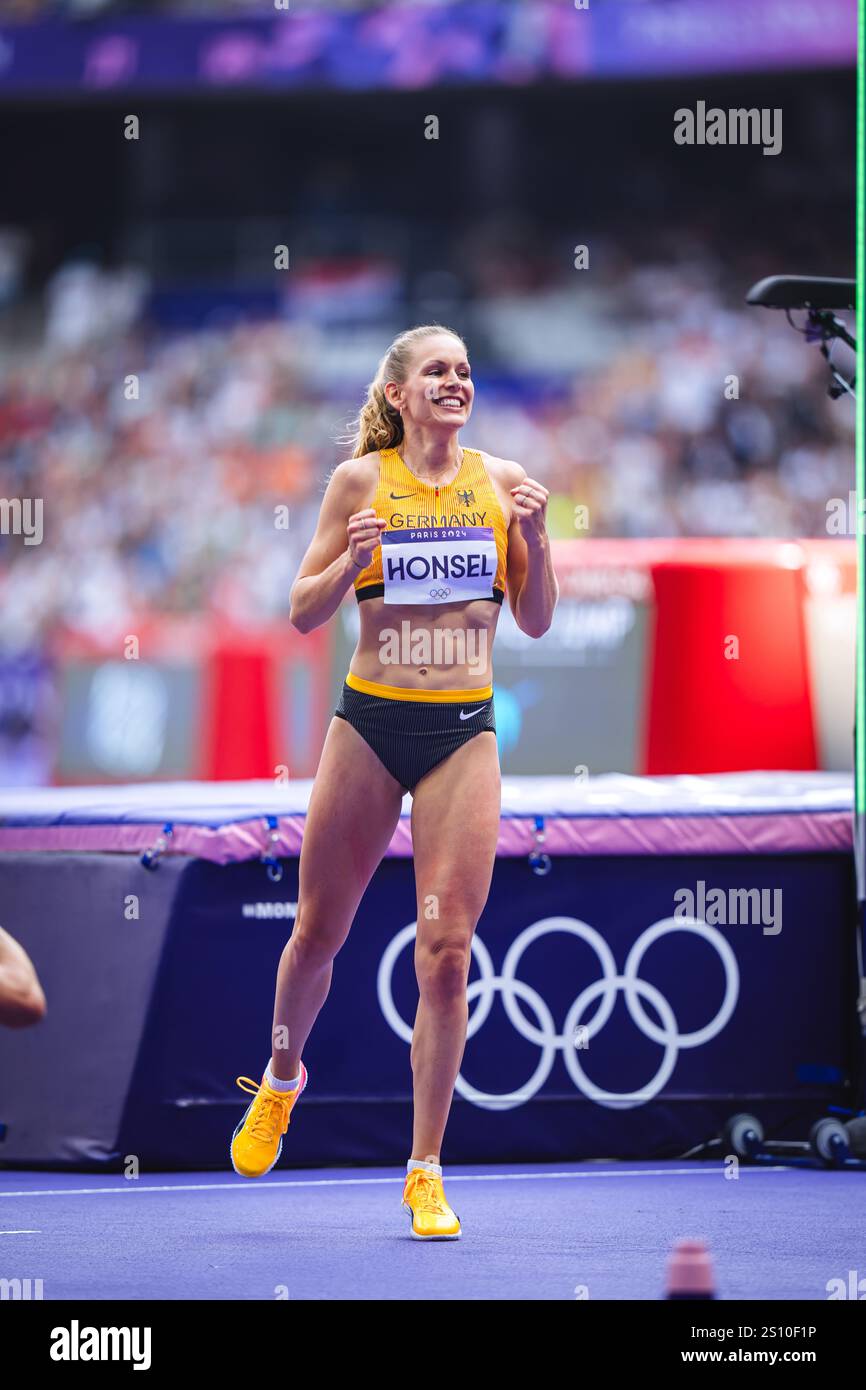 Christina Honsel participating in the high jump at the Paris 2024 ...