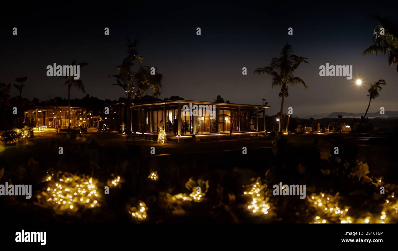Tropical resort at night with illuminated bungalows and palm trees under a moonlit sky Stock ...