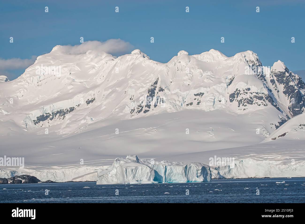view of Waterboat Point, with ice capped mountains, Antarctic peninsula ...