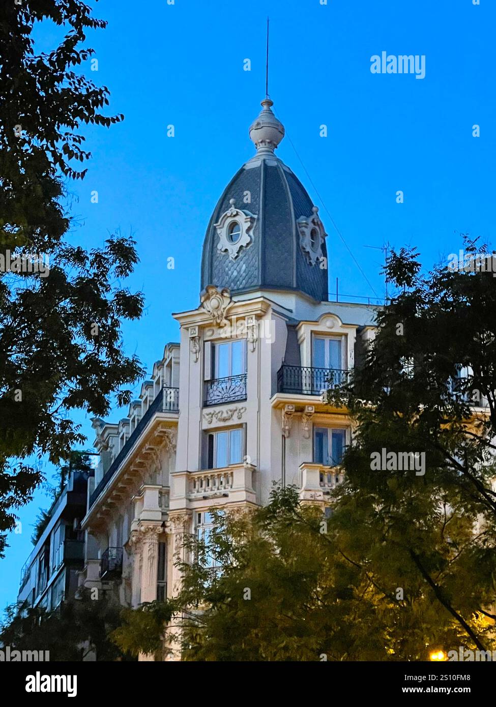 Facade of building, night view. Goya street, Madrid, Spain Stock Photo ...