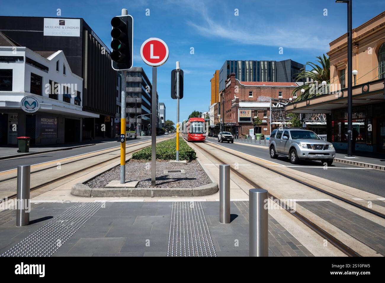 Historical buildings and light rail tram, on Hunter Street, CBD ...