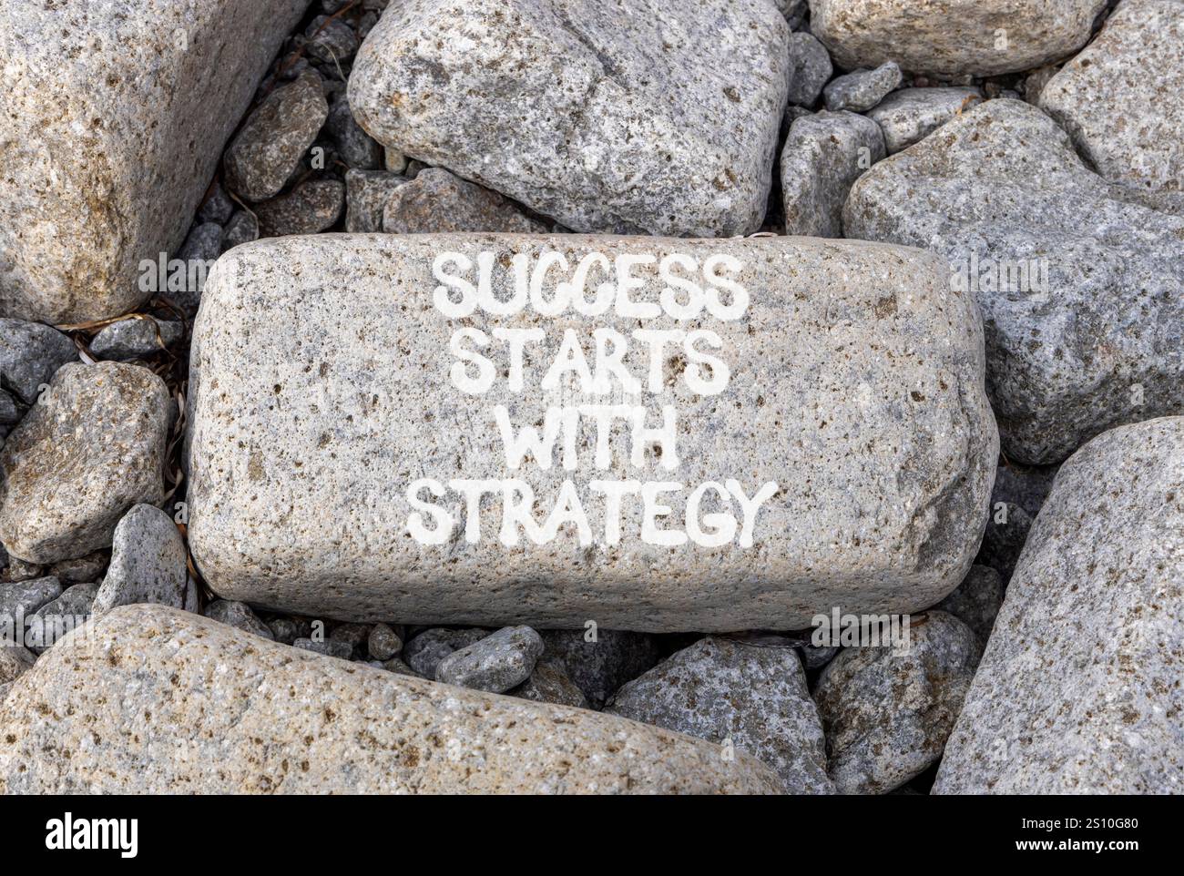 Success starts with strategy symbol. Concept words Success starts with ...