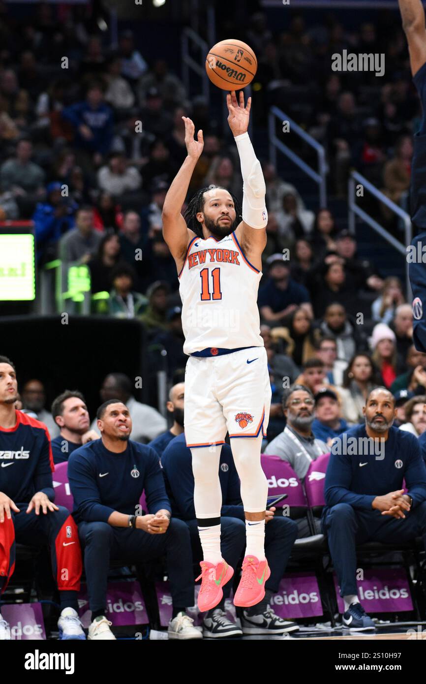 New York Knicks guard Jalen Brunson (11) attempts a three point basket ...