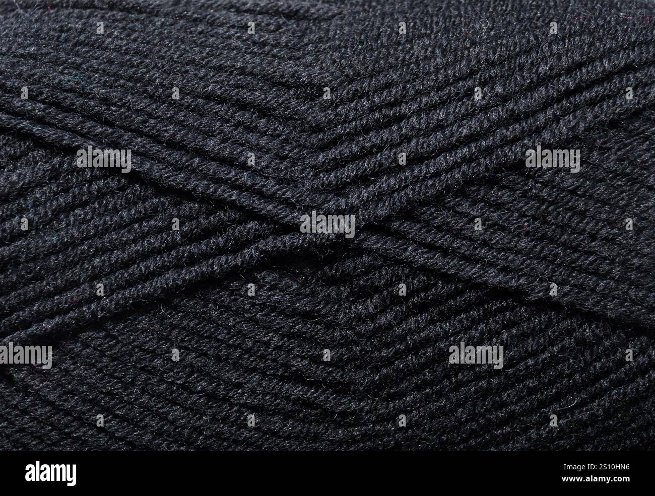 Texture of wool blend yarn, black color. Warm wool blend yarn close-up ...